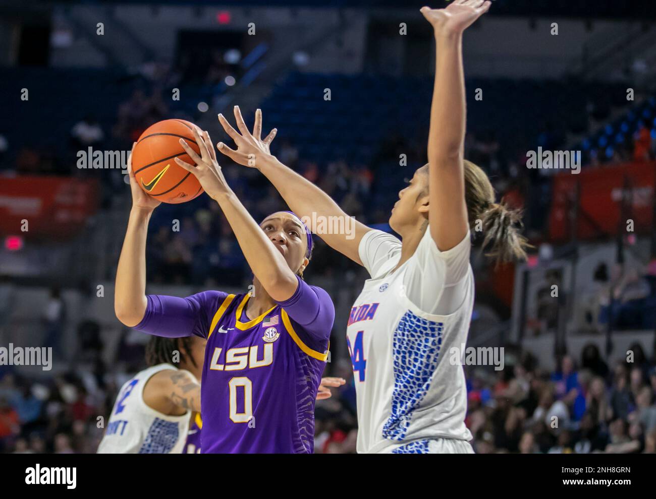 LSU forward LaDazhia Williams (0) shoots under pressure from Florida ...