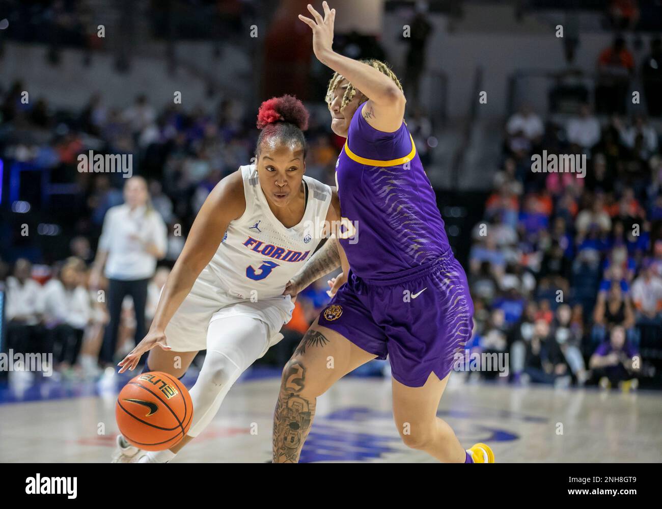 Florida guard KK Deans (3) drives past LSU guard Kateri Poole (55 ...