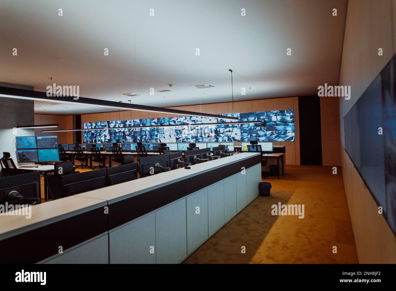 Group of Security data center operators working in a CCTV monitoring ...