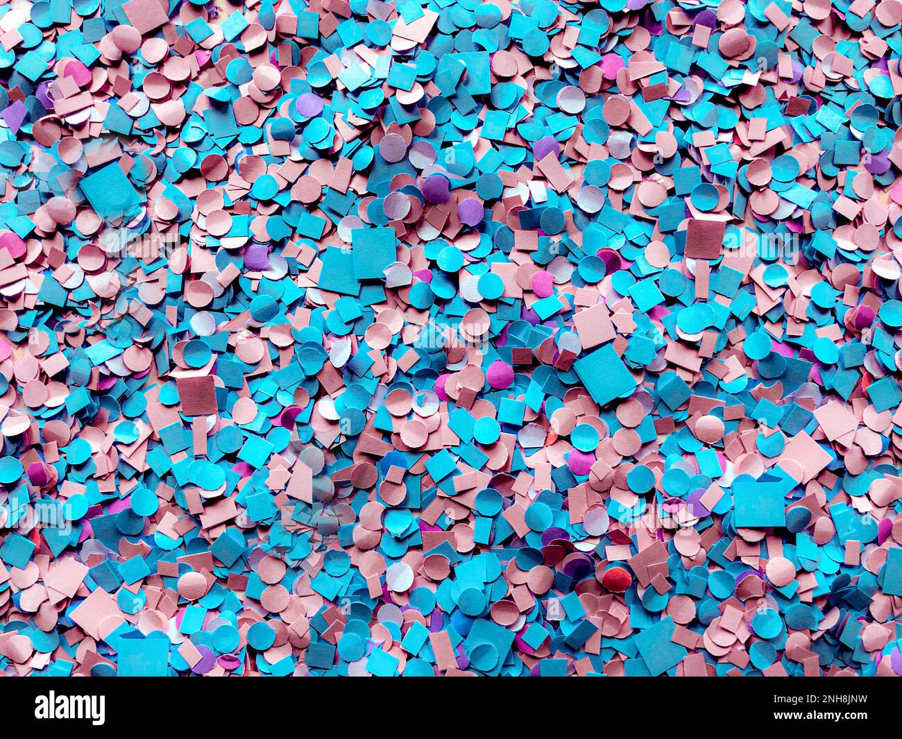 Confetti scattered in different colors on the white background. Festive ...