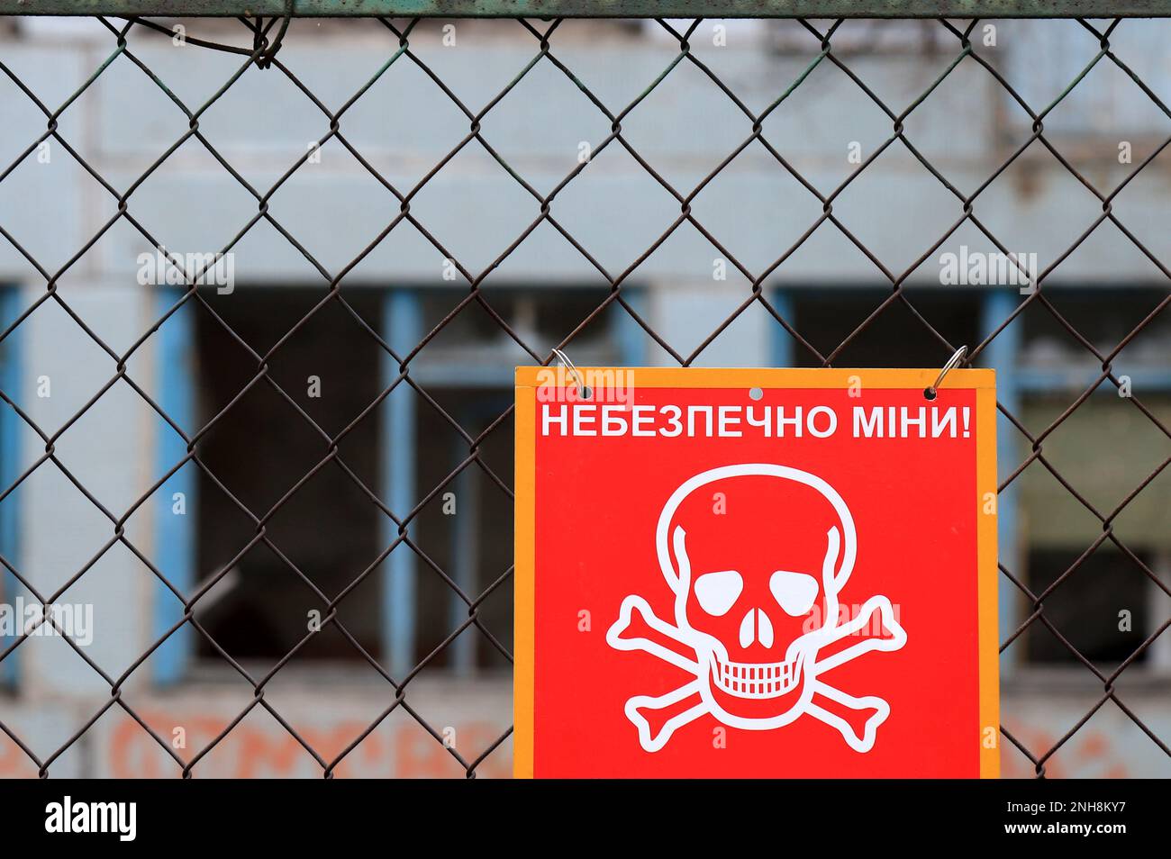 Danger mines - Red sign with inscription in Ukrainian, Skull and ...