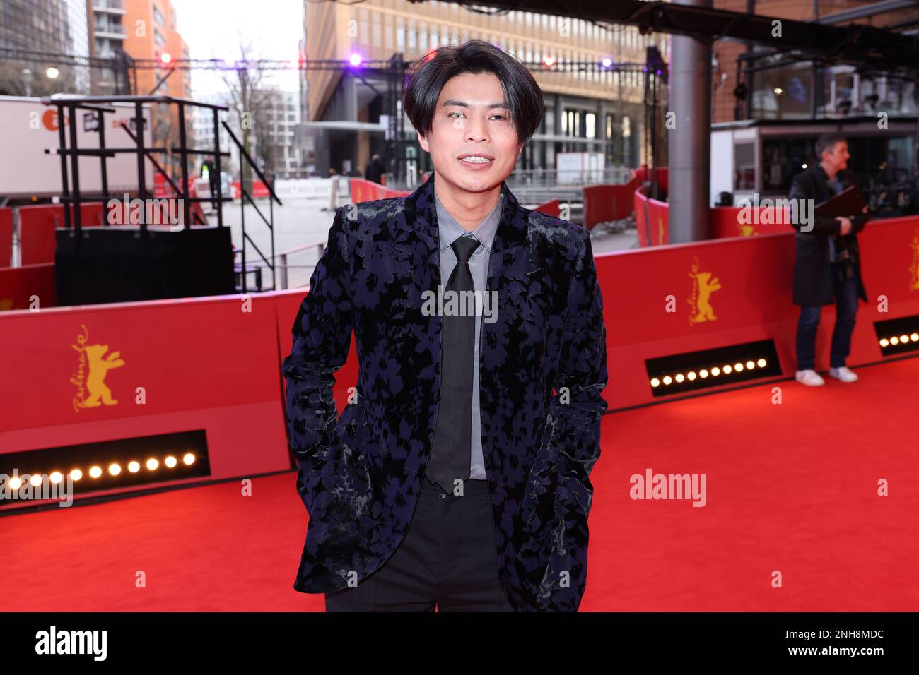 Berlin, Germany. 21st Feb, 2023. Ren Ke, actor, walks the red carpet ...