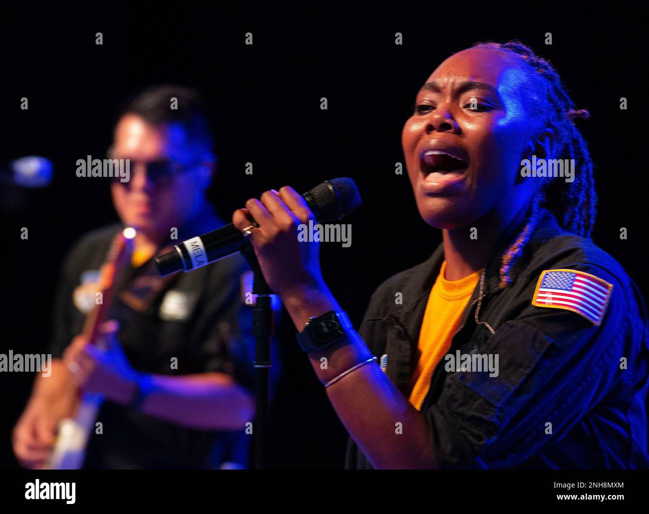 Staff Sgt. MeLan Smartt sings during an Air Force Band of Flight ...