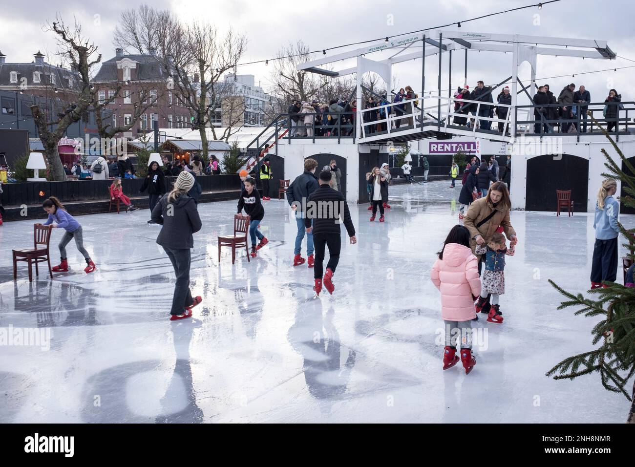 Ice skaters on the temporary ice rink set up by the Rijksmuseum on ...
