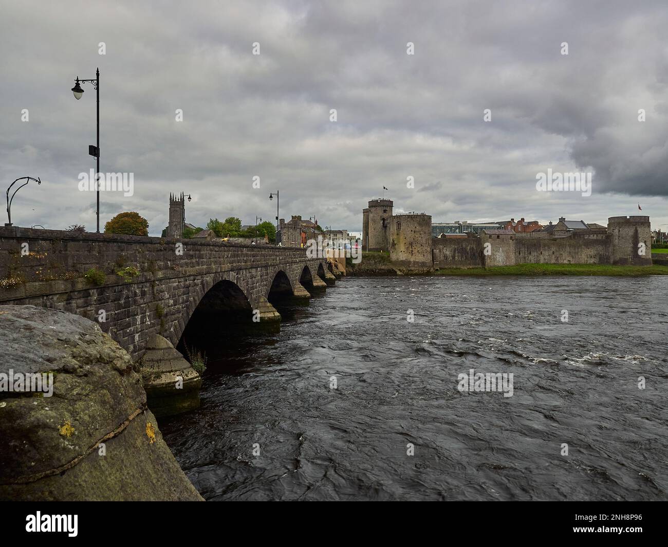 Limerick, Ireland - 09 18 2015: old historic bridge crossing the river ...