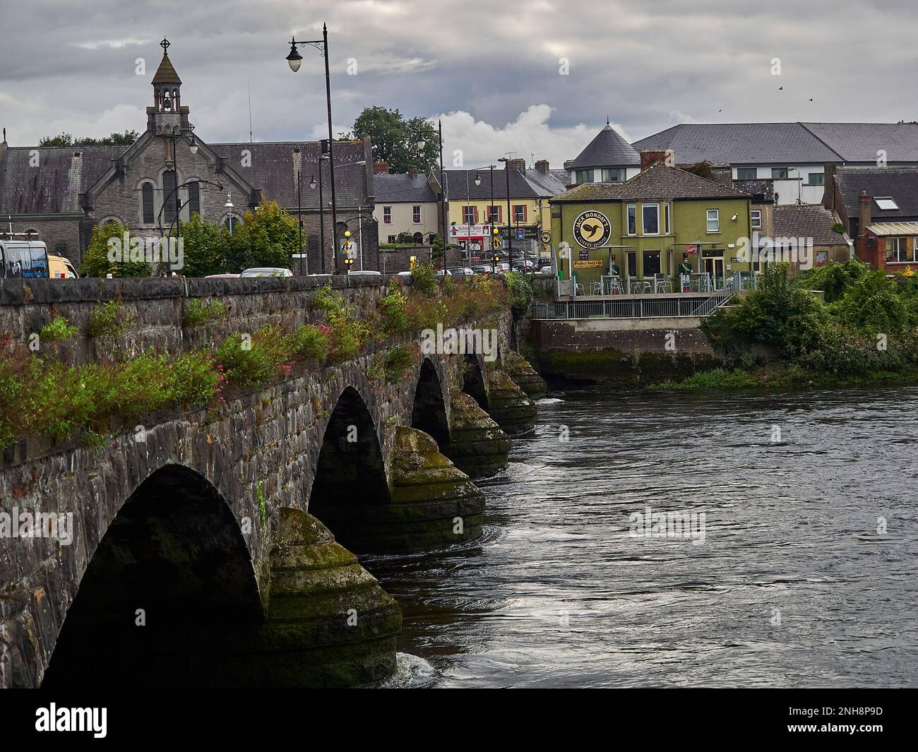 Limerick, Ireland - 09 18 2015: old historic bridge crossing the river ...