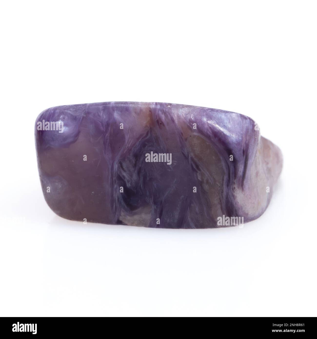 Natural gem purple charoite isolated on white background Stock Photo ...