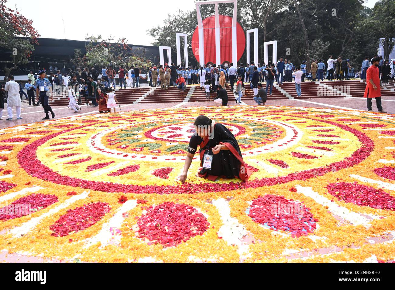 Dhaka, Bangladesh. 21st Feb, 2023. A volunteer arrange flower petals at ...