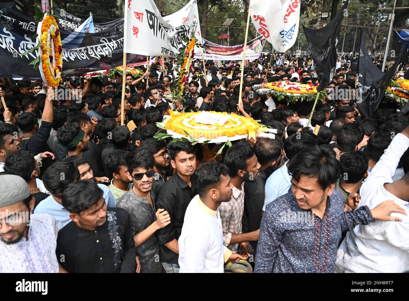 Dhaka, Bangladesh. 21st Feb, 2023. People lay flower wreaths at the ...