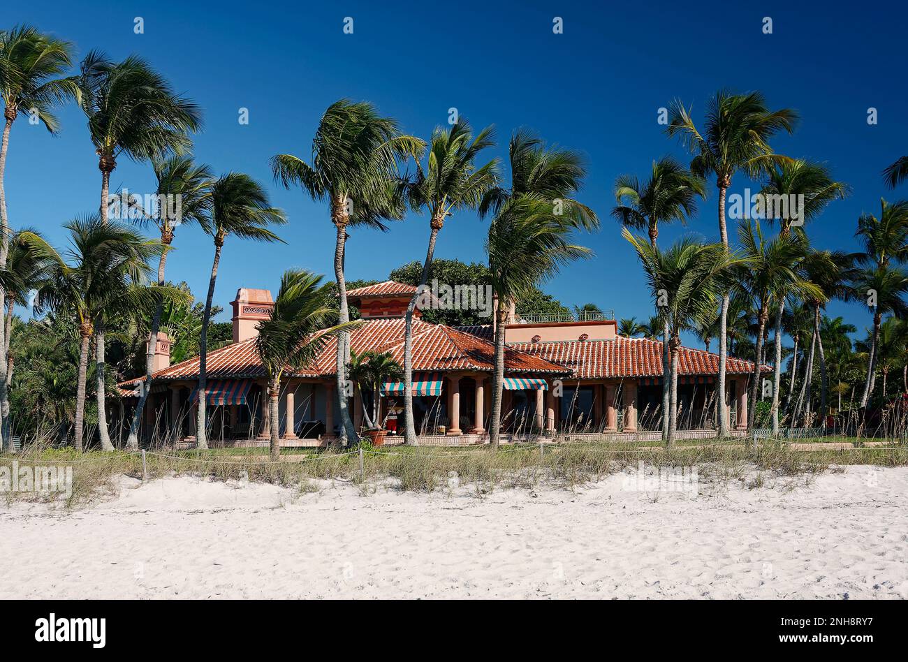large house, terracotta roof, awnings, pillars, beach front, sand, palm ...