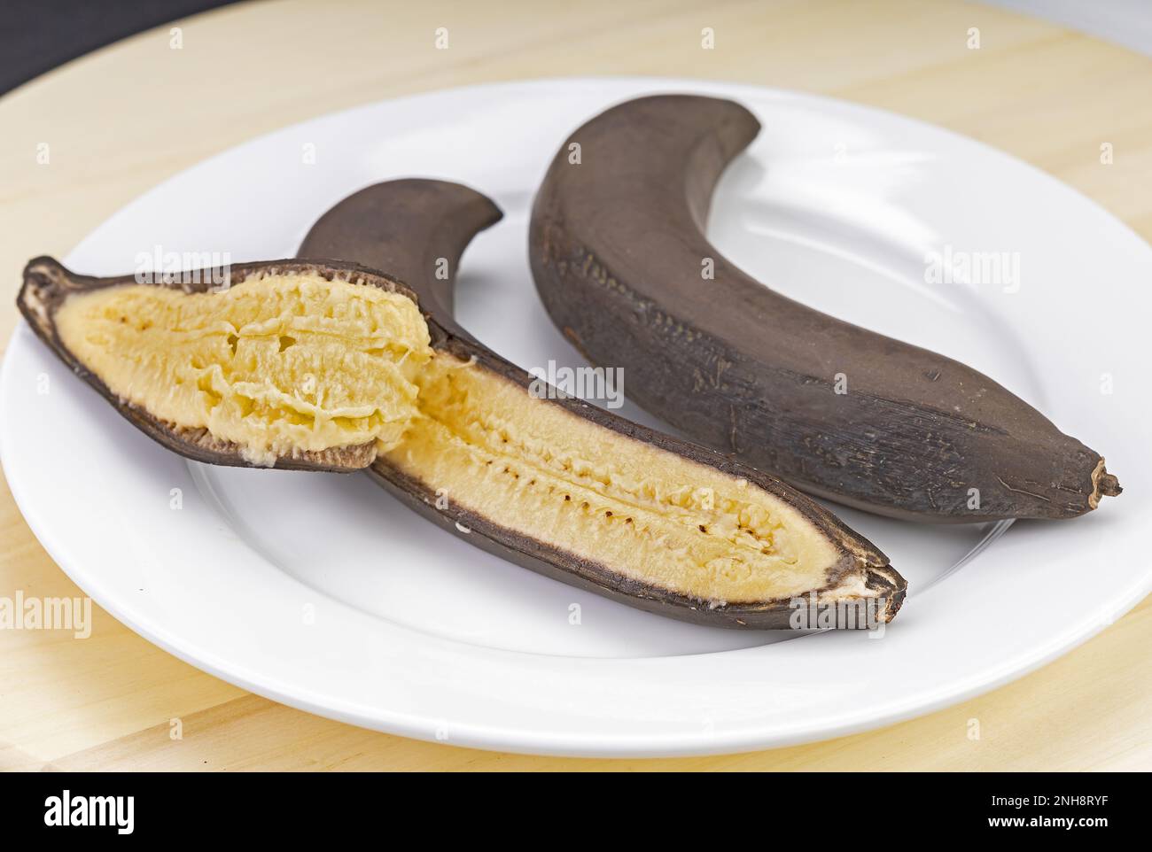 Chilled bananas, left at room temperature for too long, black peel ...