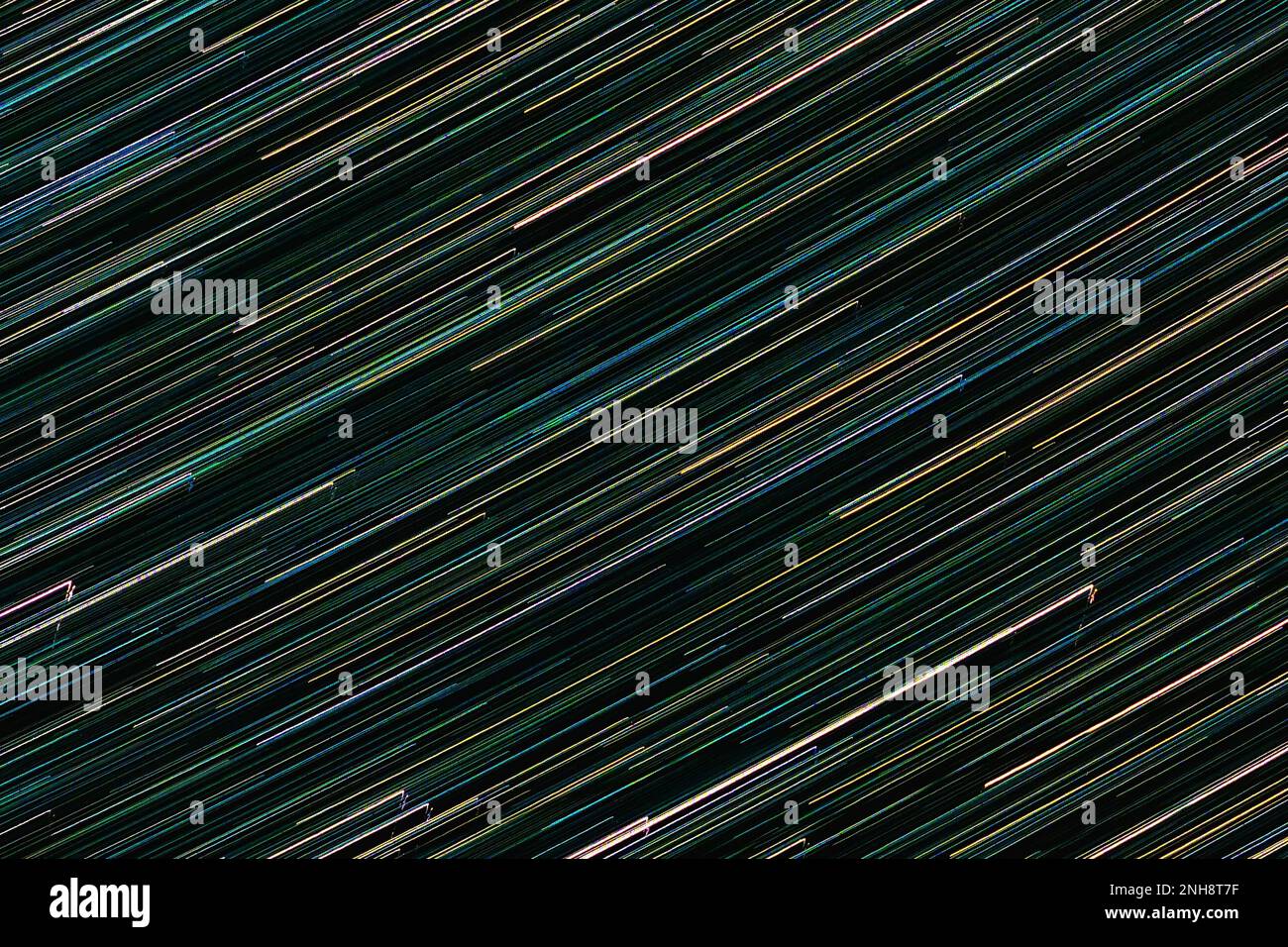 Traces of stars and planets in night sky. Luminous tracks of movement ...