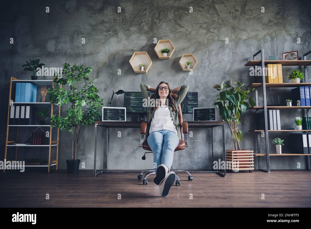 Photo of dreamy happy lady hacker wear eyeglasses finishing task hands ...