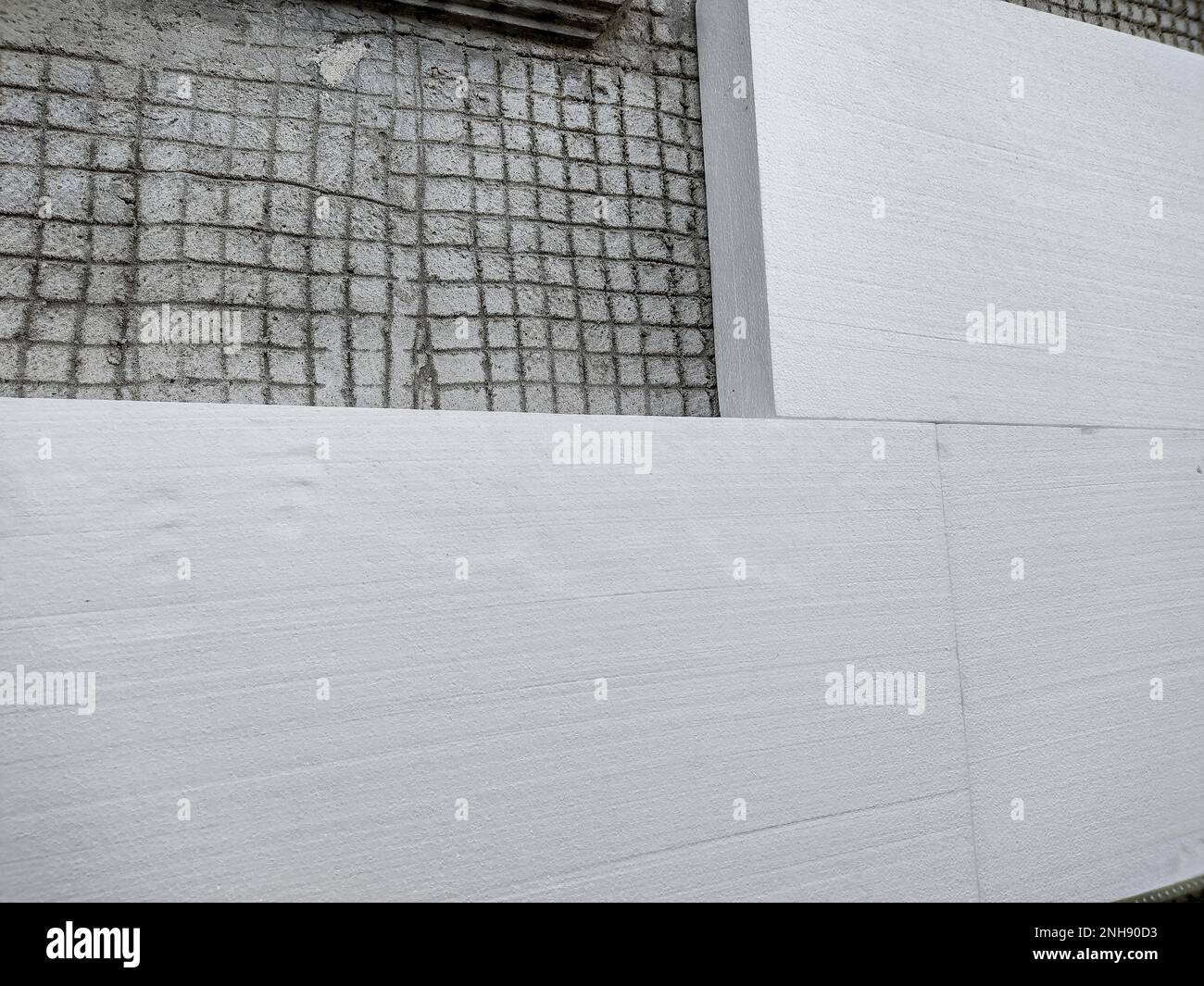 a house is thermally insulated with polystyrene - construction concept ...