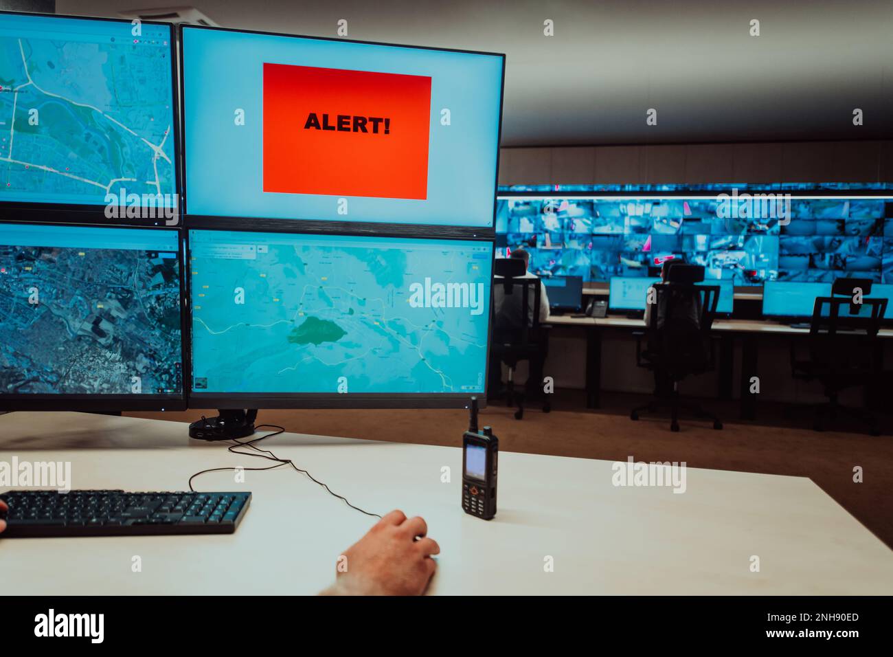 Group of Security data center operators working in a CCTV monitoring ...