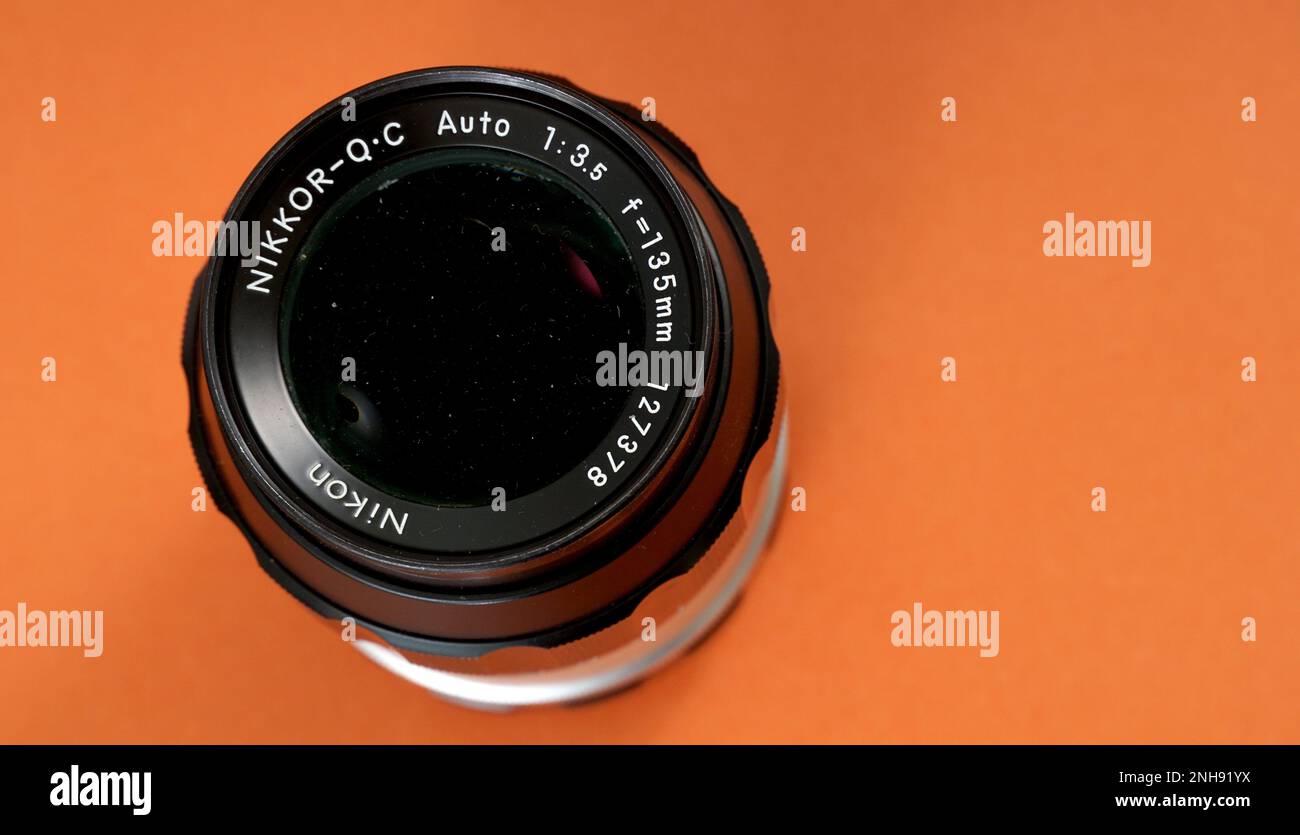 RESEN, MACEDONIA. FEBRUARY 20, 2023-vintage film lens on orange ...