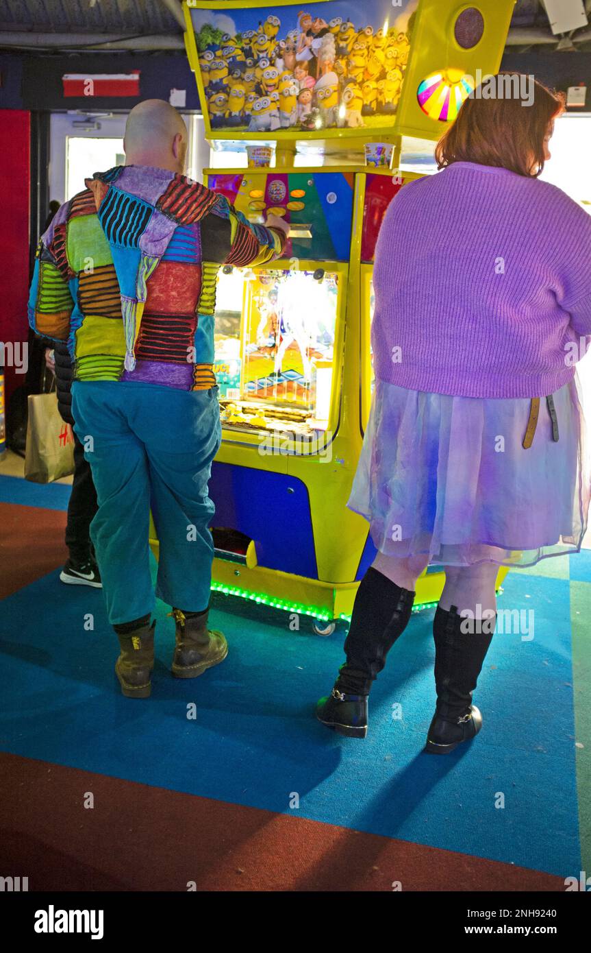 People playing video games at an arcade hi-res stock photography and ...