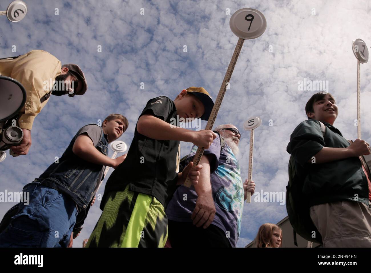 A parade of numbers circle Piers 15 and 17 during a celebration of Pi ...