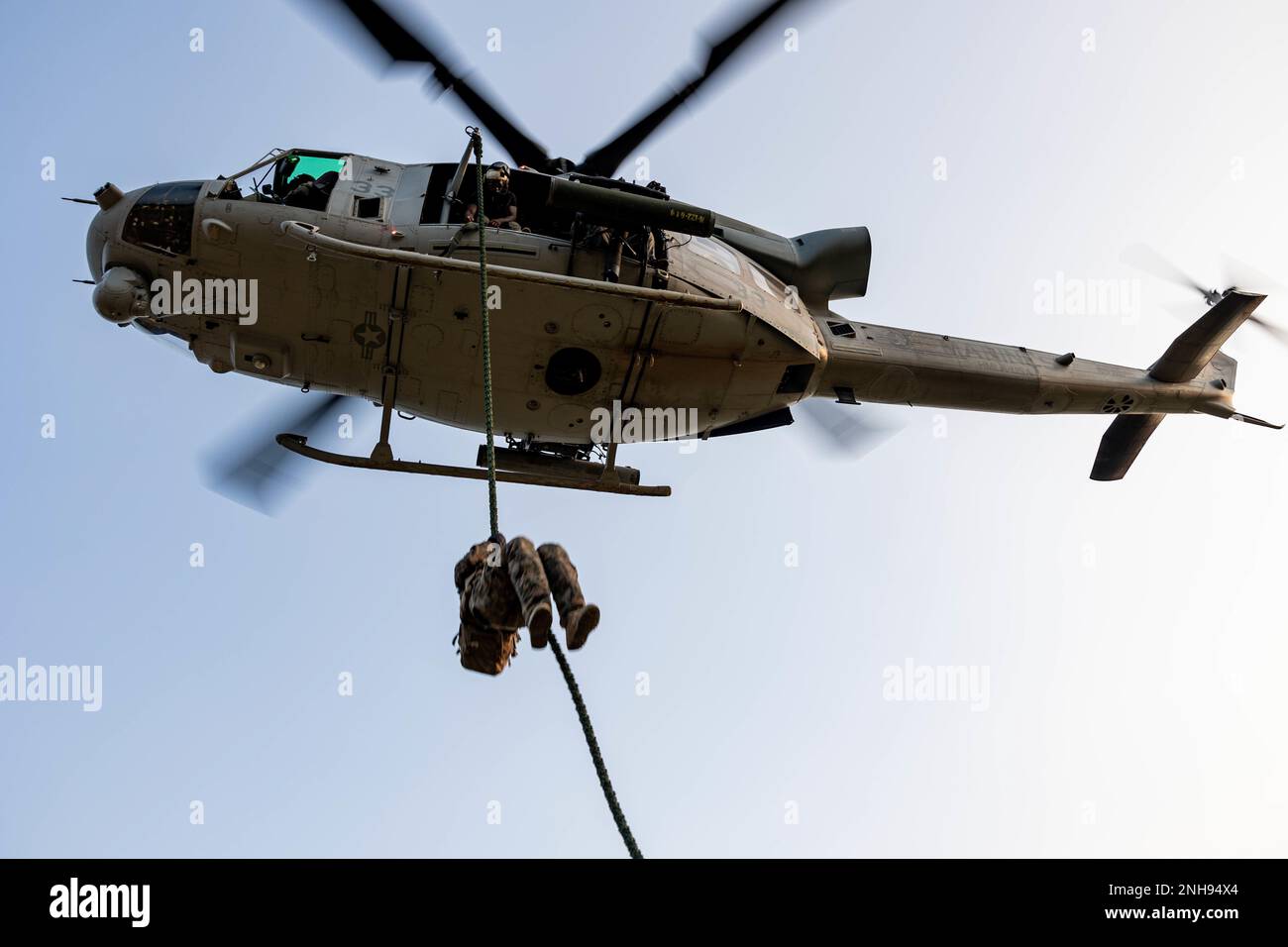 U.S. Marines with Marine Wing Support Squadron (MWSS) 171 fast rope out ...