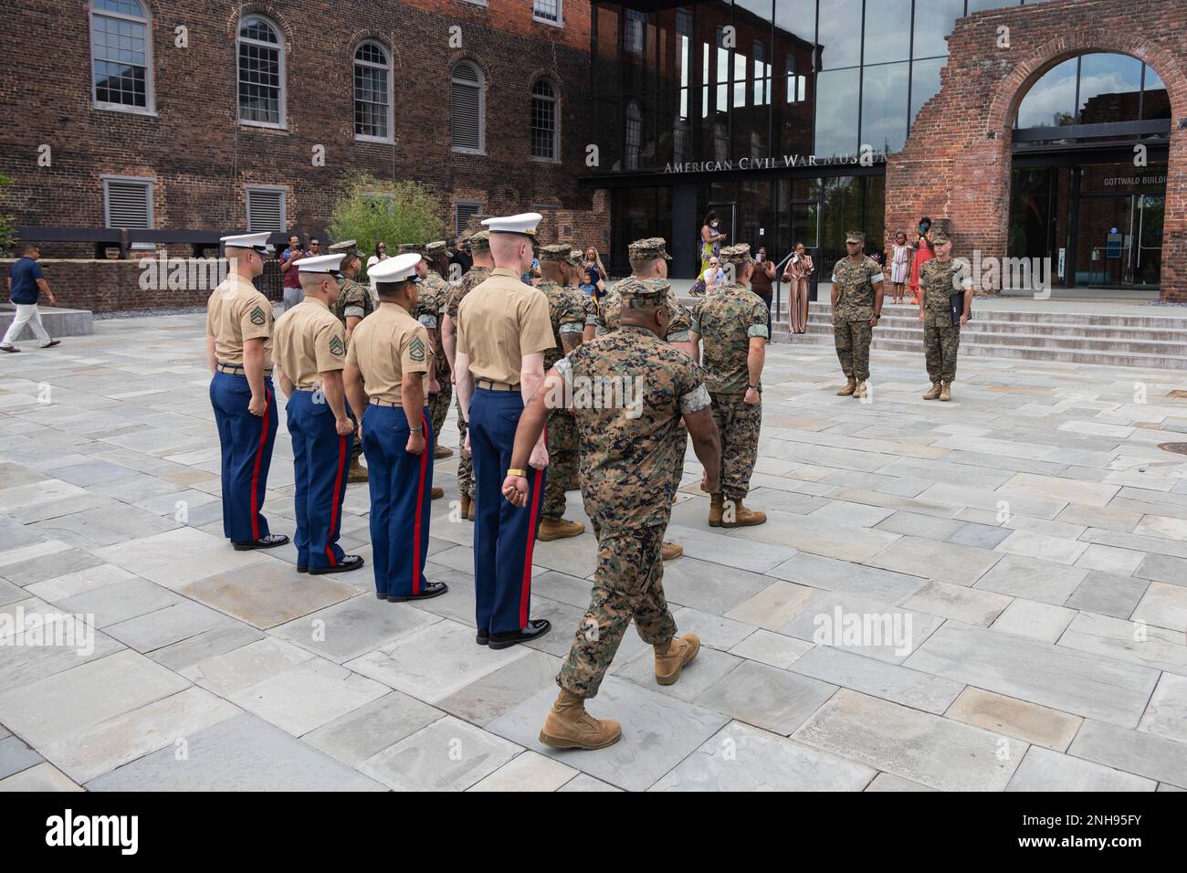 U.S. Marines with Recruiting Station Richmond, 4th Marine Corps District, stand in formation ...