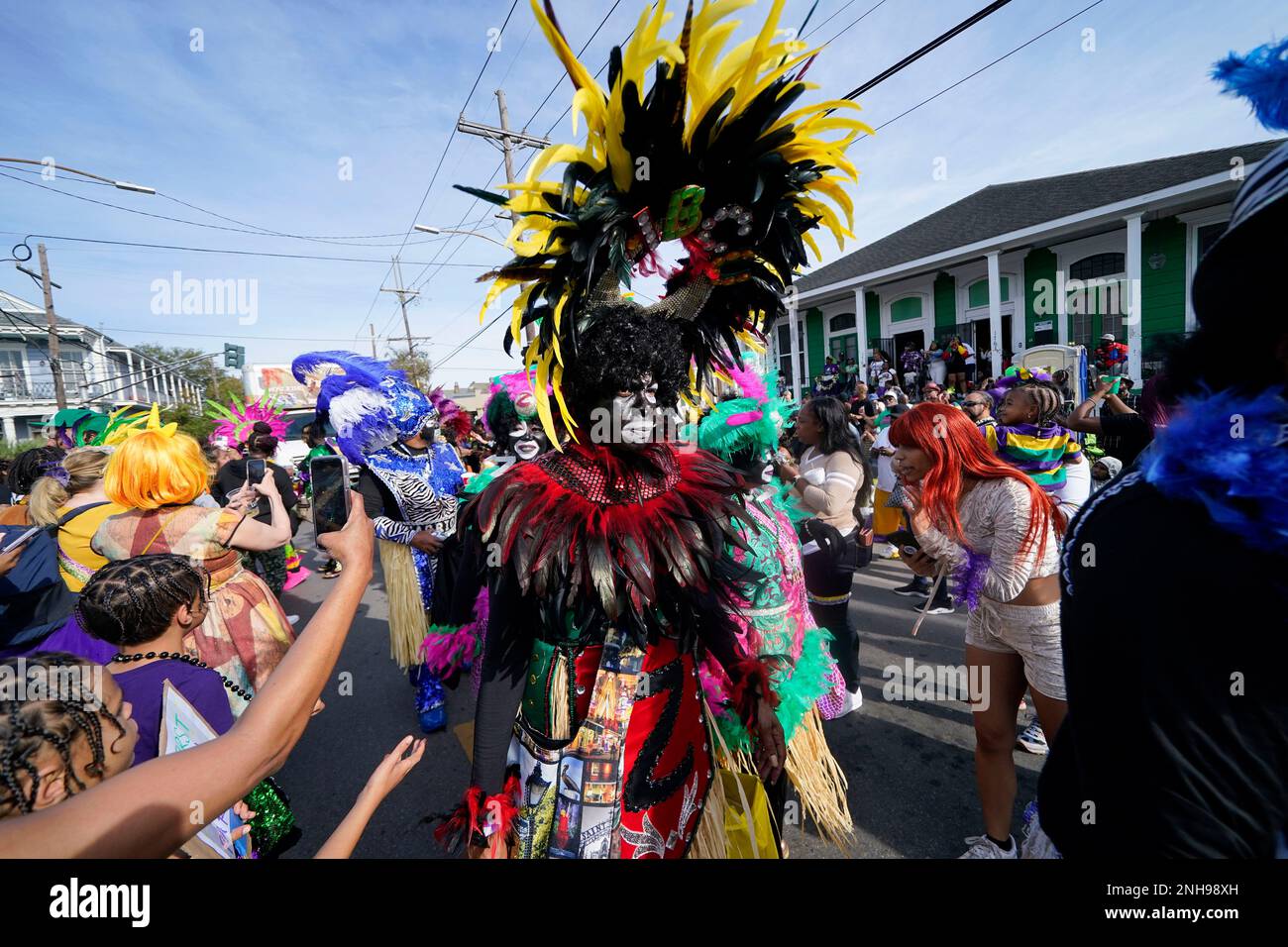 A member of the traditional Mardi Gras group The Tramps marches during ...