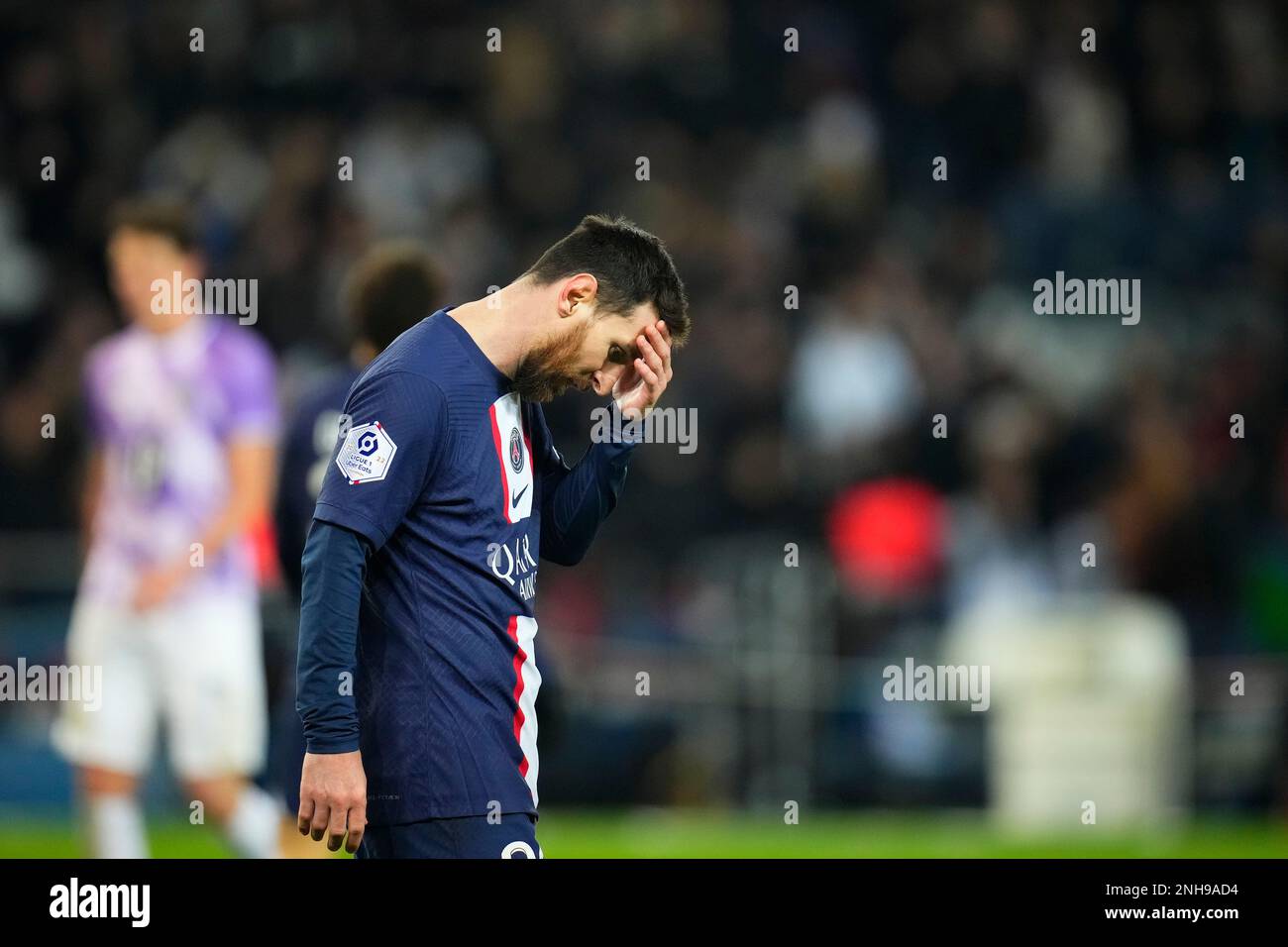 PARIS, FRANCE - FEBRUARY 4: Leo Messi eacts after missing a shot during ...