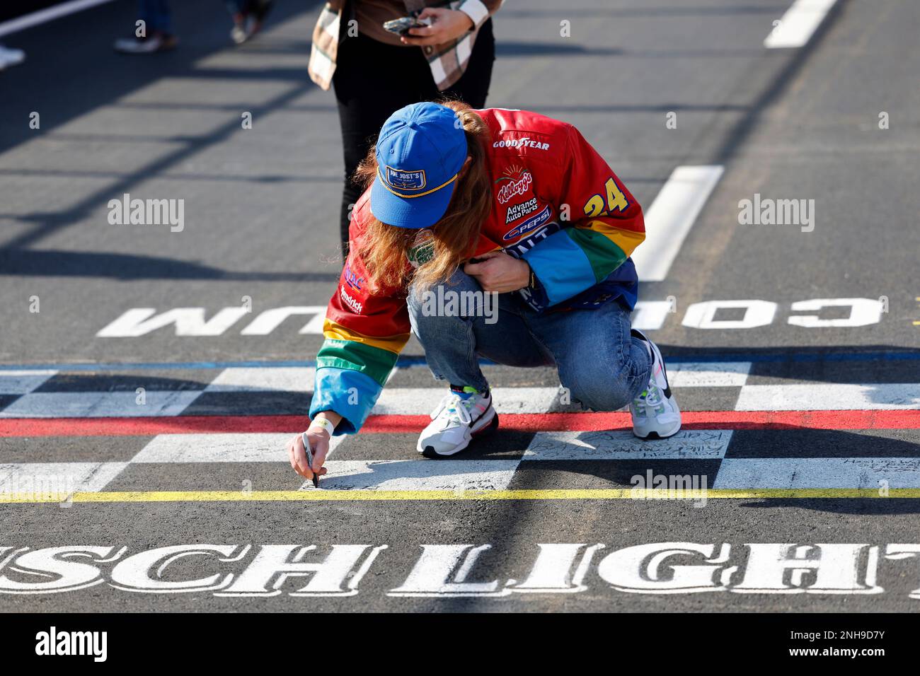 LAS VEGAS, NV - FEBRUARY 04: A fan signs the start-finish line during ...
