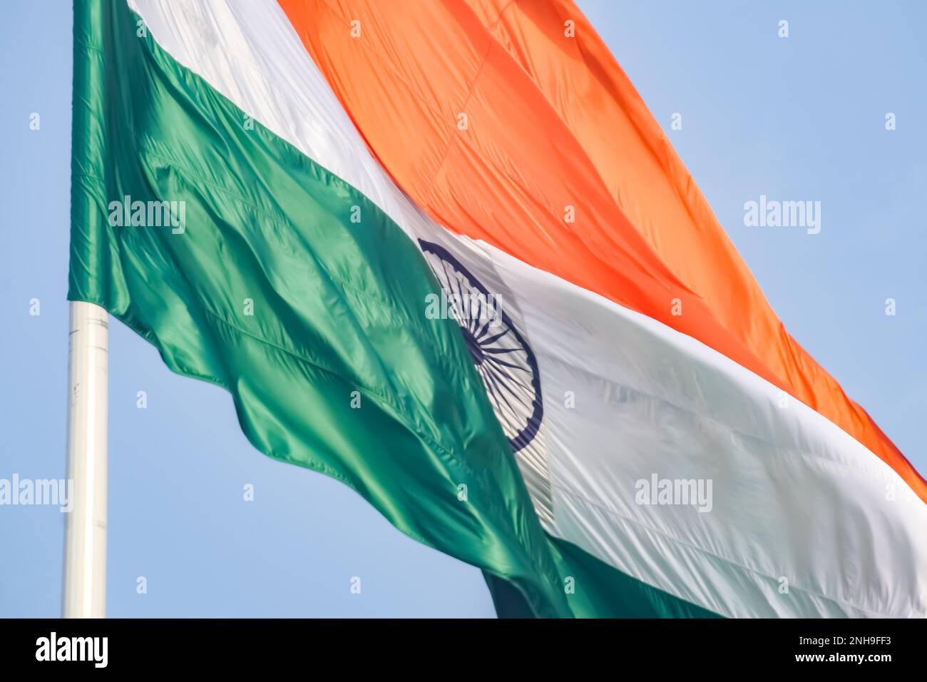 India flag flying high at Connaught Place with pride in blue sky, India ...