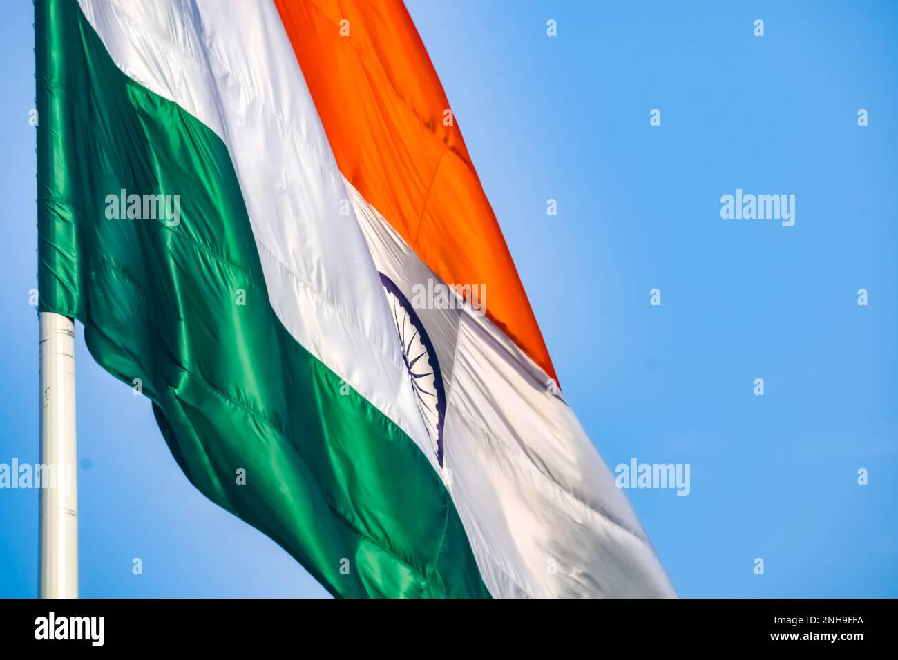 India flag flying high at Connaught Place with pride in blue sky, India ...