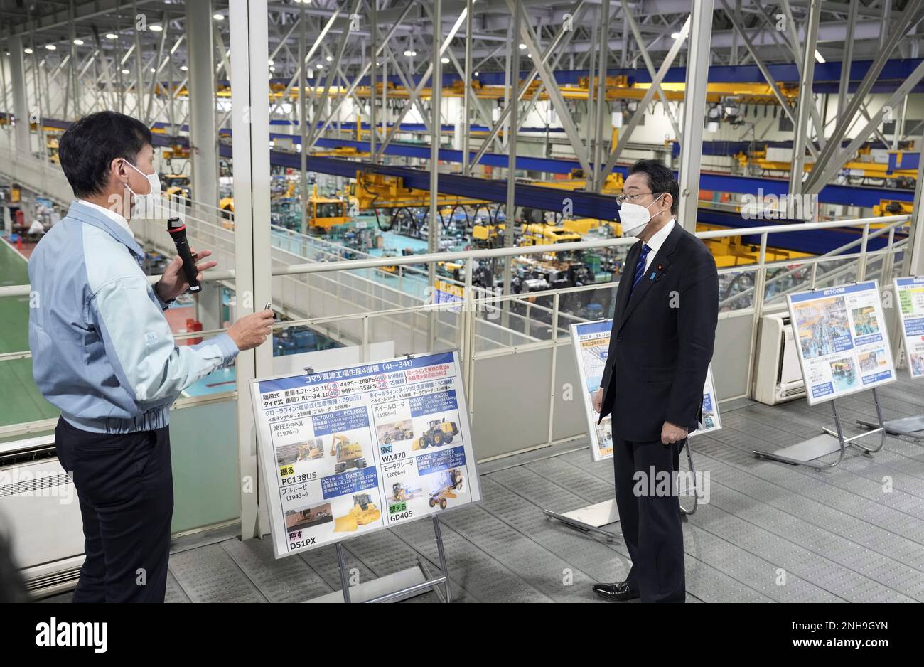 Japanese Prime Minister Fumio Kishida inspects a factory of Komatsu, a ...