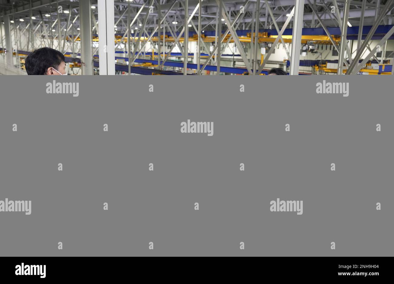 Japanese Prime Minister Fumio Kishida inspects a factory of Komatsu, a ...