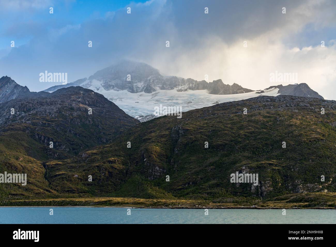 Ice and snow on mountains in Glacier Alley of Beagle channel in Chile ...