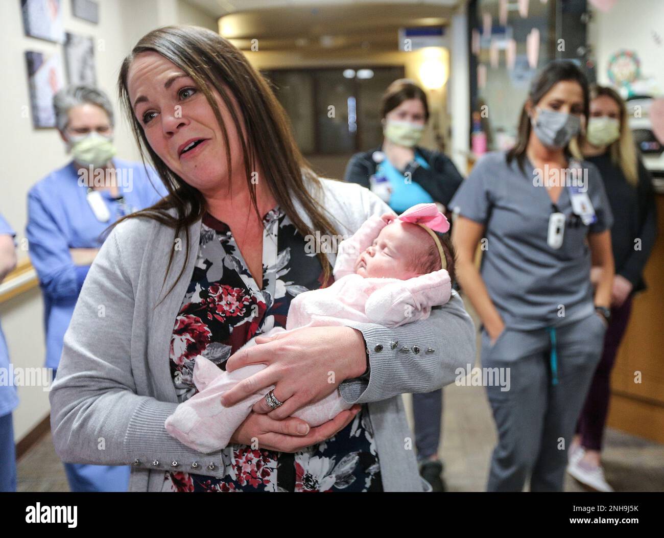 UnityPoint Health–Finley Hospital Dr. Cara Leppellere holds Gwendolyn Yeo, the daughter of Traci ...