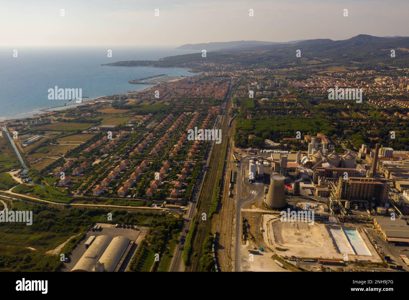 Drone photography of big chemical factory, house and railway during ...