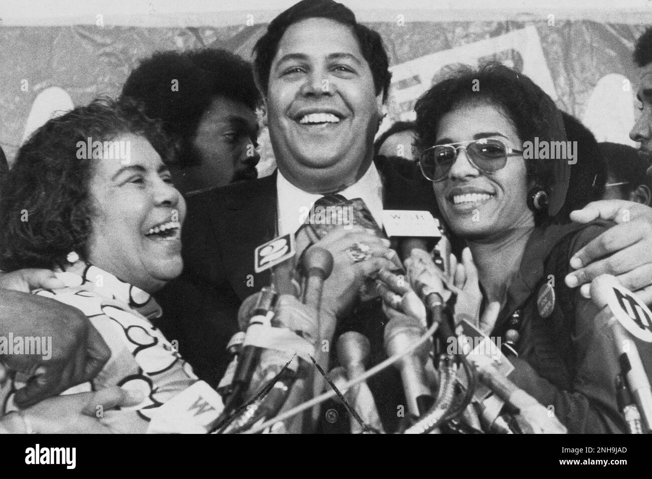 Maynard Jackson hugs his mother, Dr. Irene Dobbs Jackson, and his wife ...
