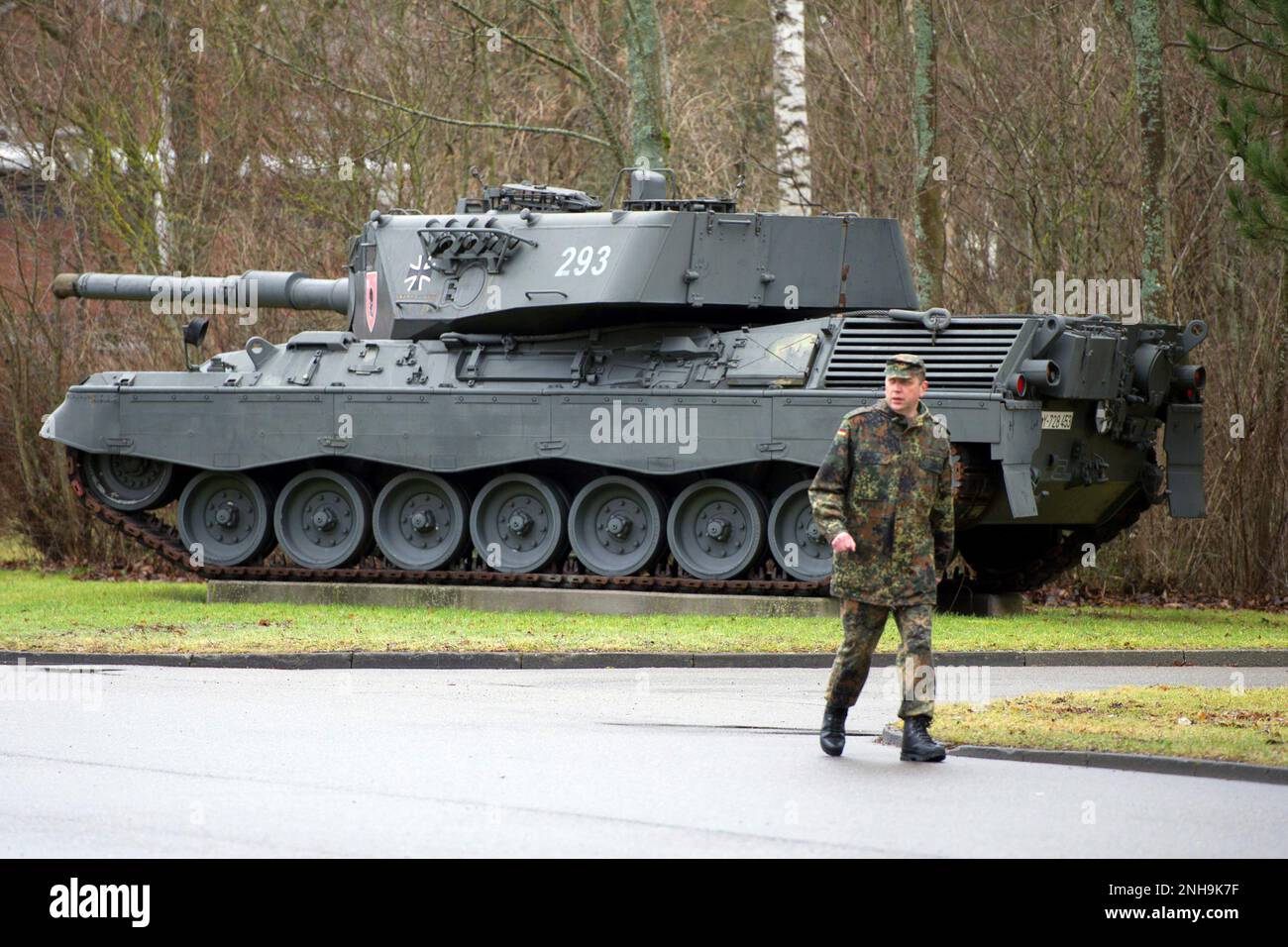 FILE - A soldier walks past a Leopard 1 A4 main battle tank on display ...