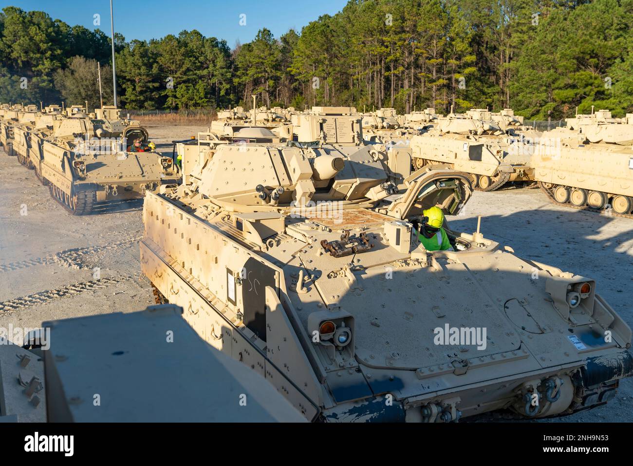 In this image provided by U.S. Transportation Command, a stevedore sits ...