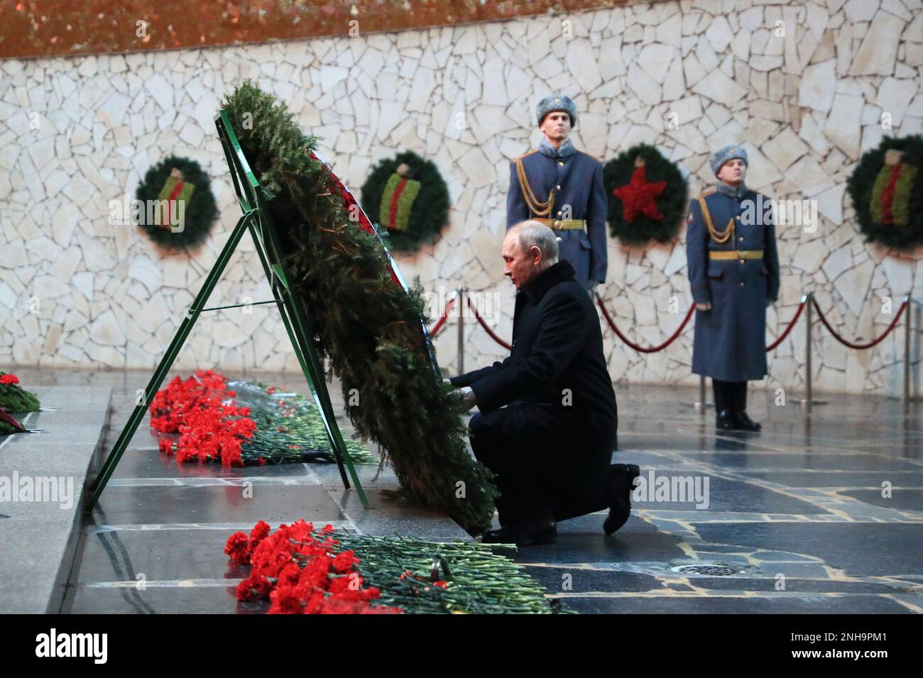Russian President Vladimir Putin attends a commemoration, inside the ...