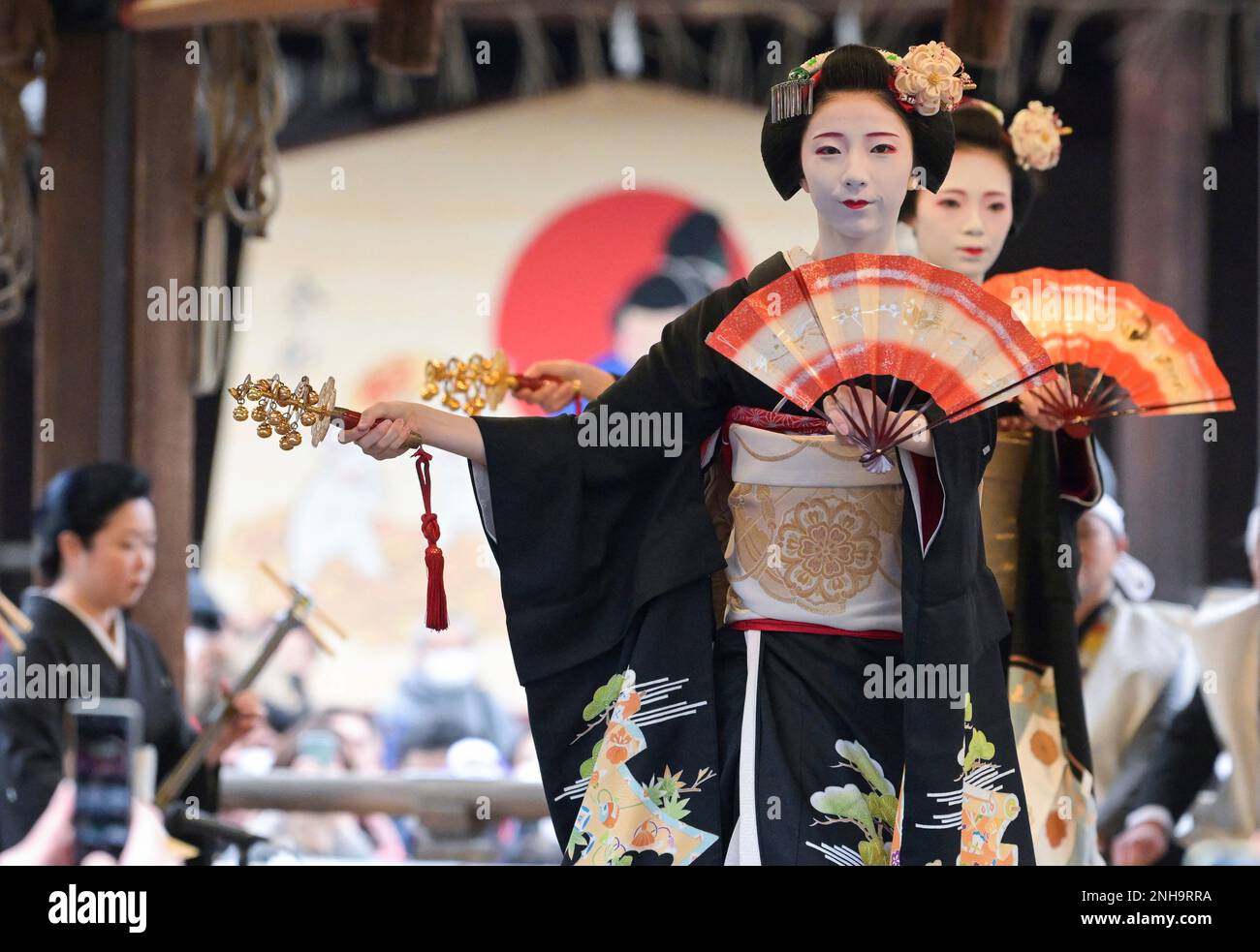 Maiko (apprentice geisha) dressed in kimono (traditional Japanese cloth ...