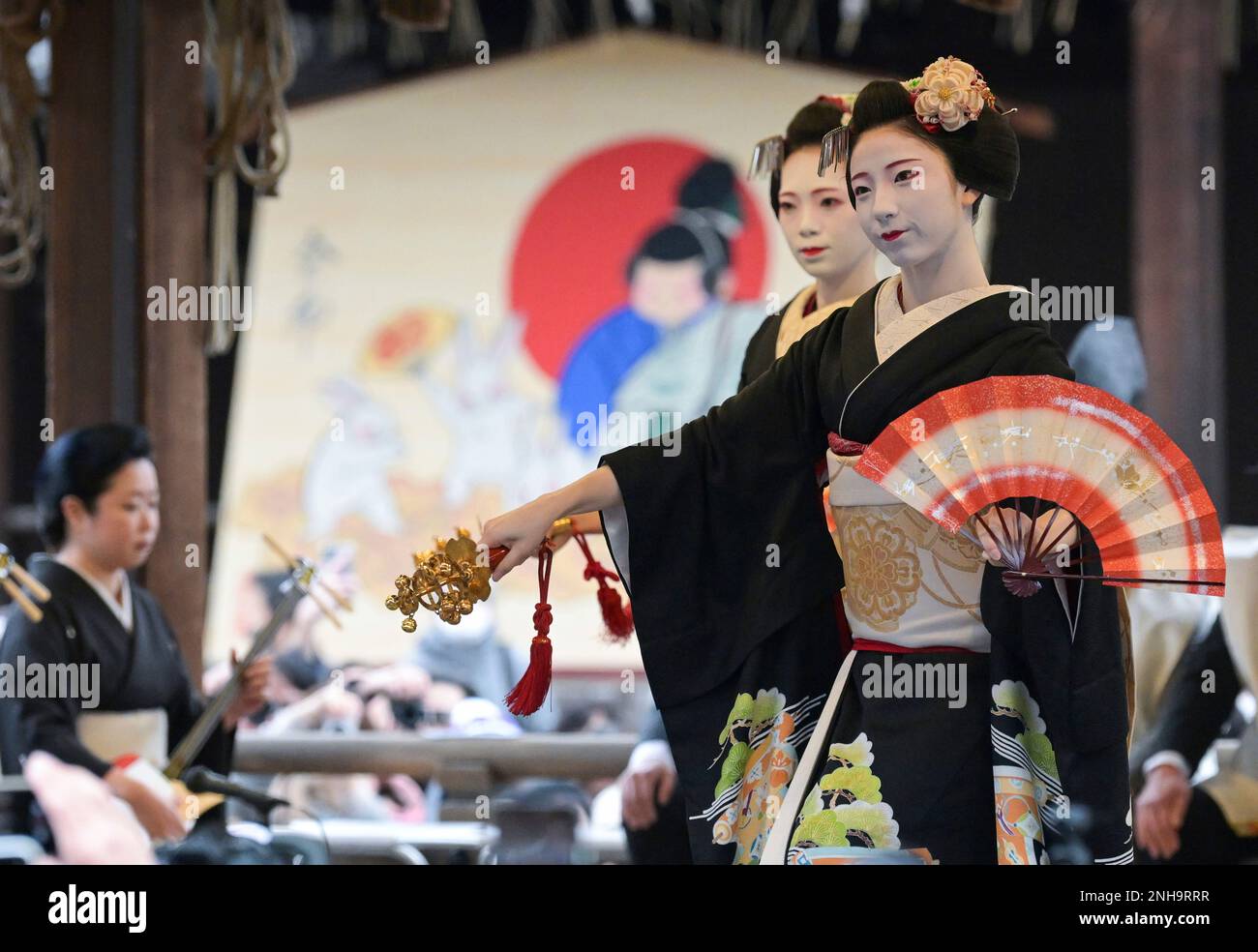 Maiko (apprentice geisha) dressed in kimono (traditional Japanese cloth ...