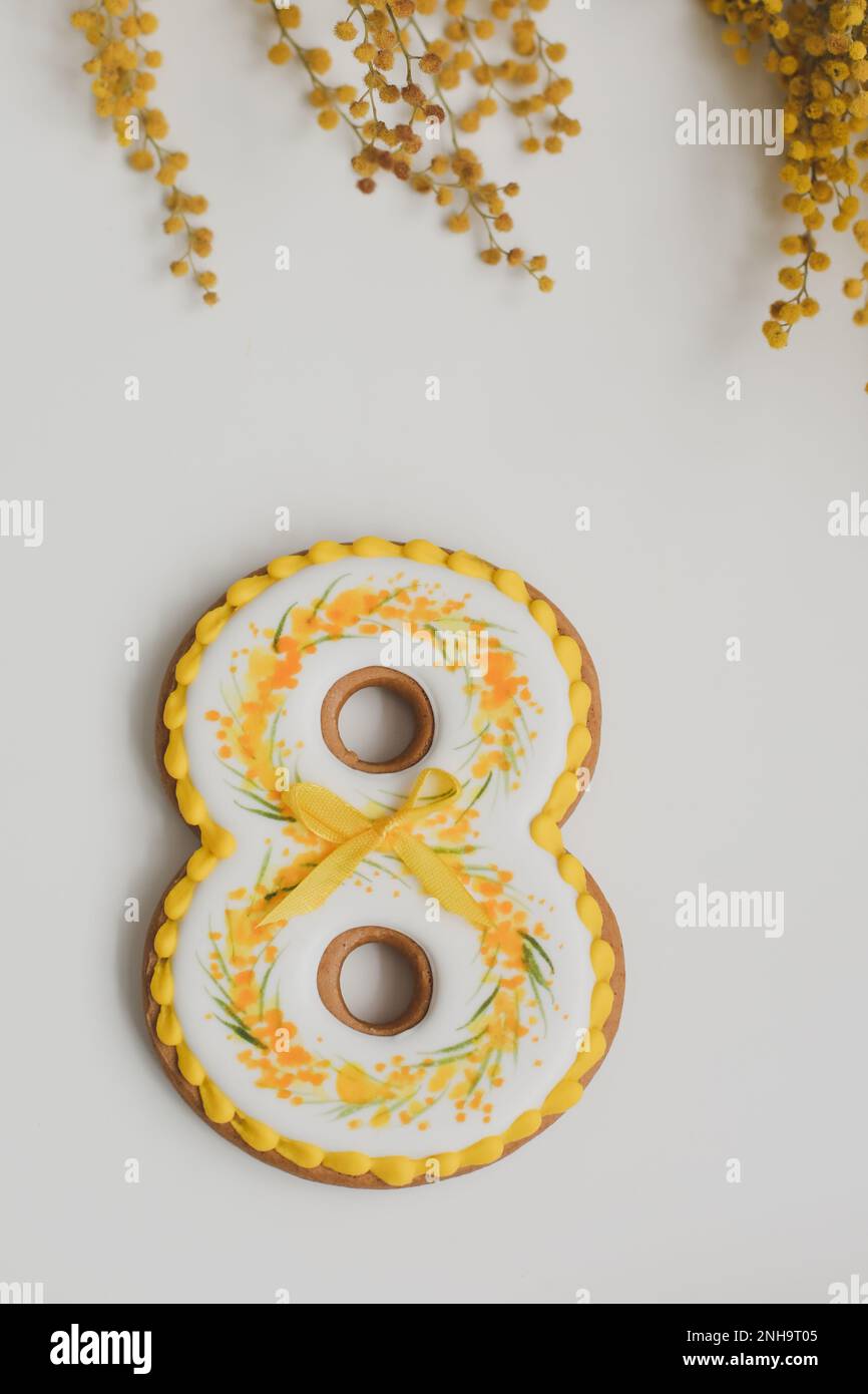 Greeting for International Women's Day on March 8th. Branches of mimosa ...