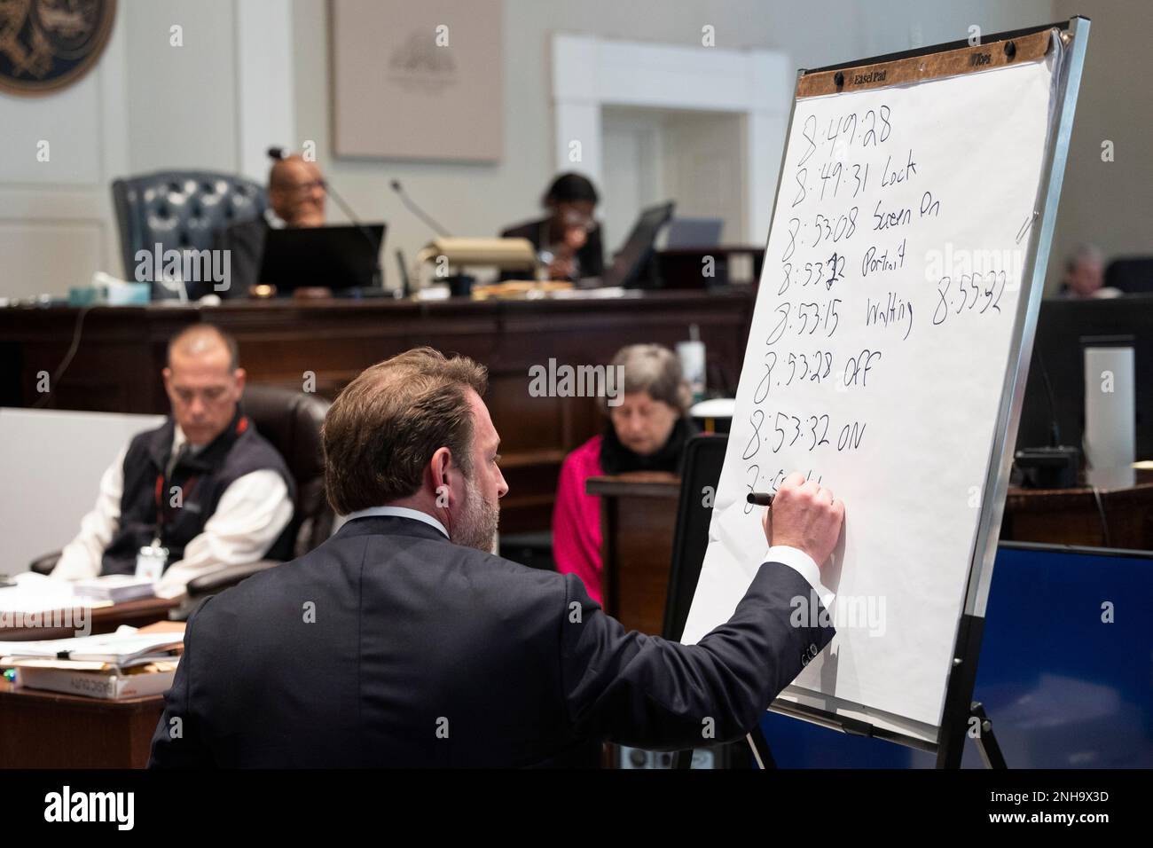 Defense attorney Phillip Barber writes out a timeline of events on ...