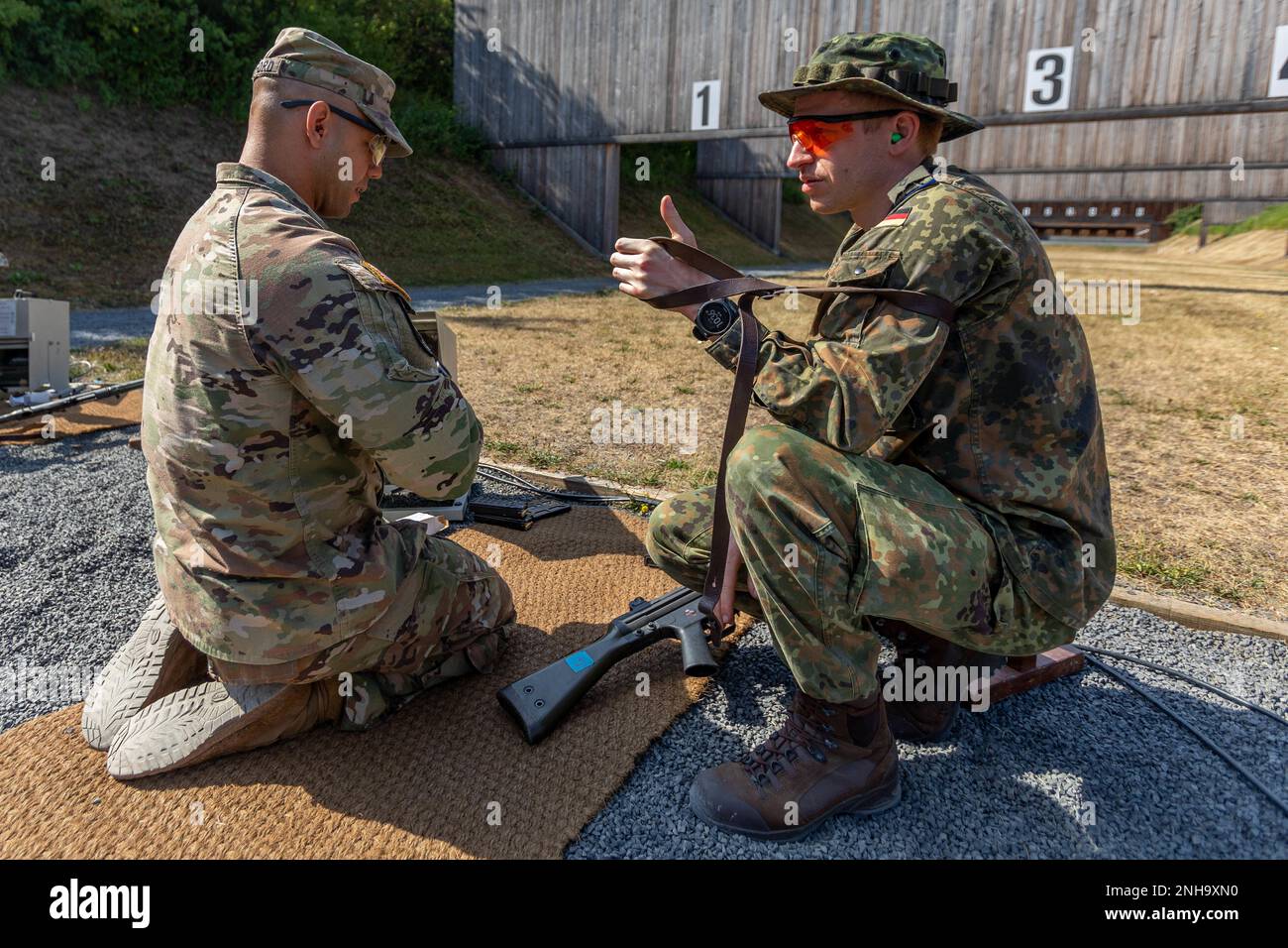 Army Reserve Staff Sgt. Devin Crawford (left), 108th Training Command ...