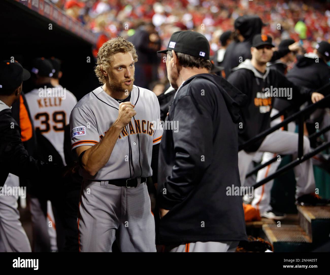 Hunter Pence (8) fist bumps manager Bruche Bochy before Game 2 of the ...