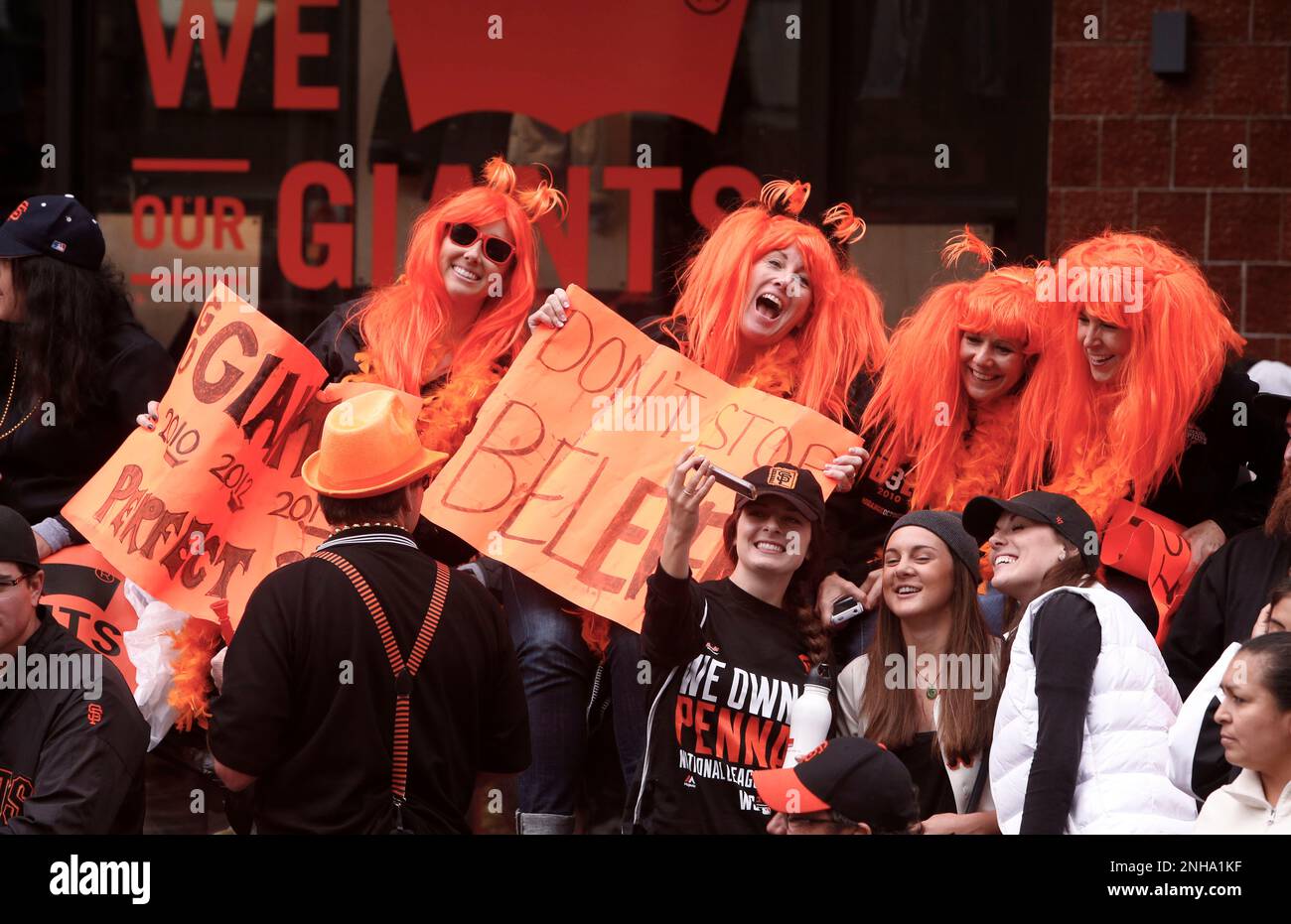 Self described "Gamer Babes" with Giants' orange hair, (l to r ...
