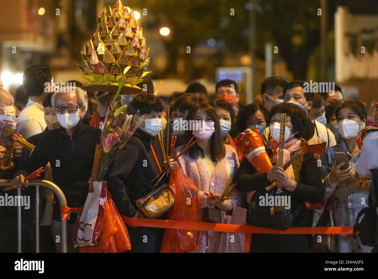Worshippers pray for good fortune during the Kwun Yum Treasury Opening ...