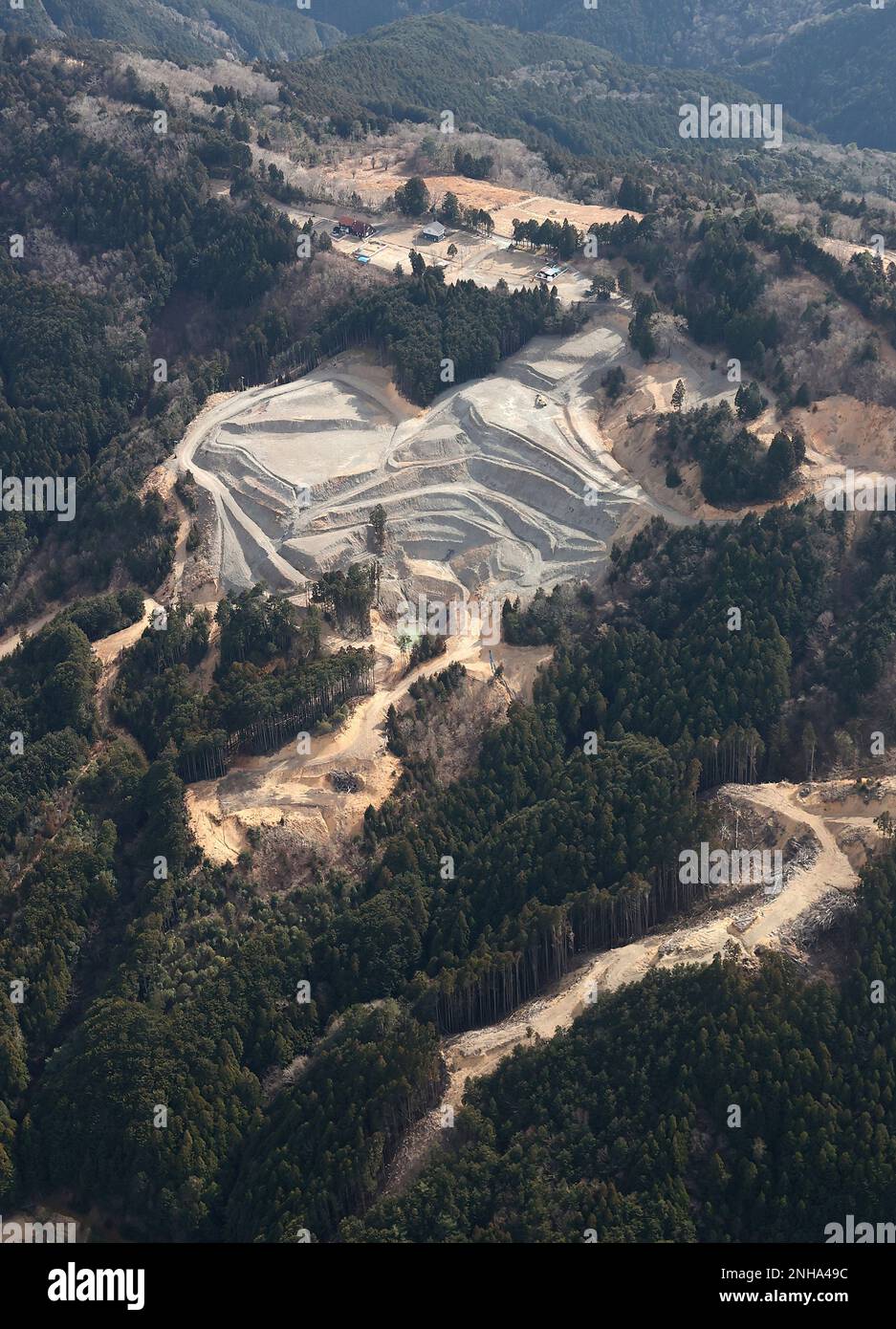 A photo shows a mound formed by piling up the soil on a mountain in ...