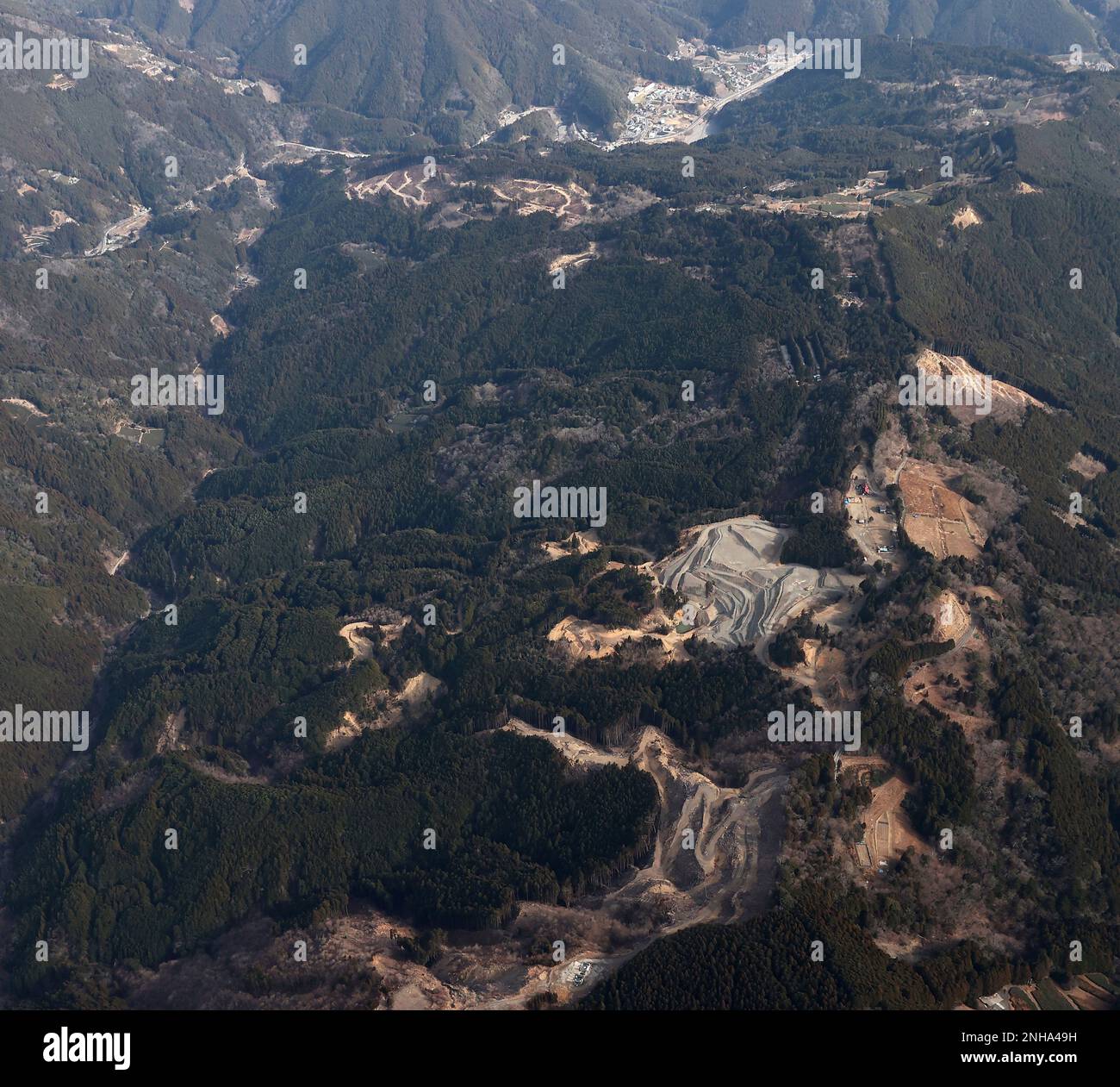 A photo shows a mound formed by piling up the soil on a mountain in ...