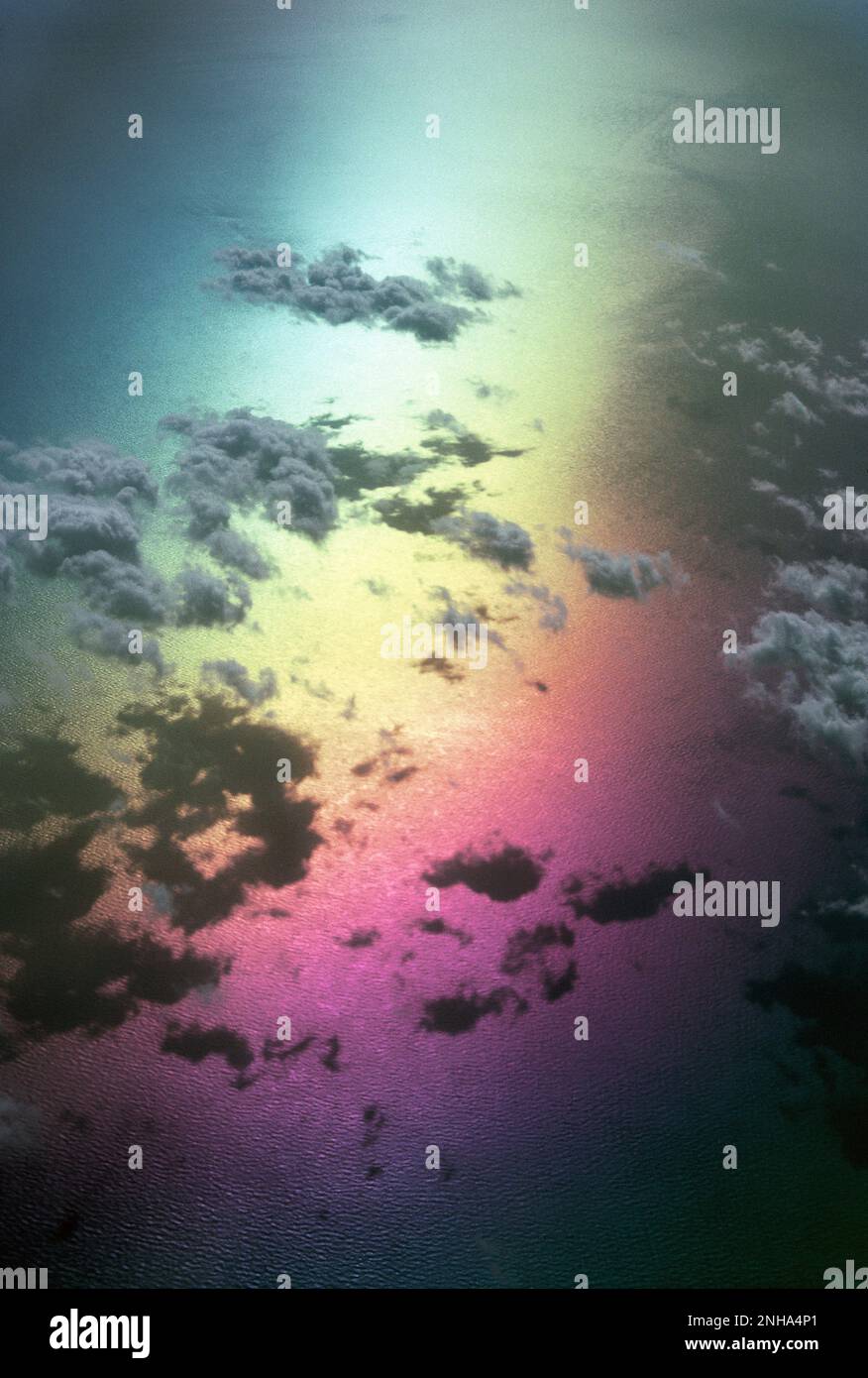 Aerial view of Indian Ocean from jet aircraft window above the clouds ...