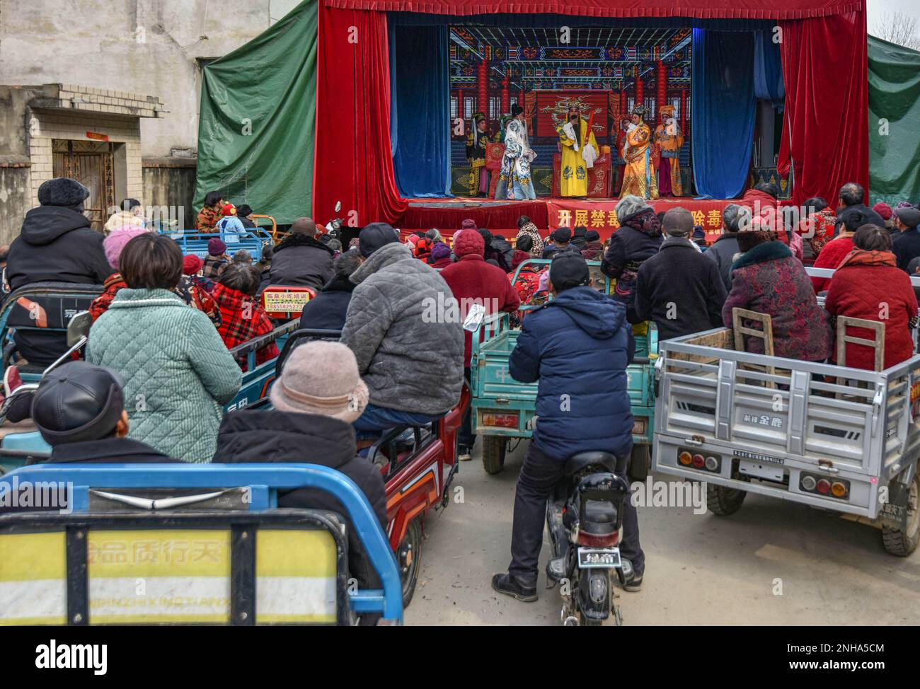 Fuyang, China. 21st Feb, 2023. People from the countryside are watching ...